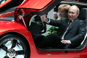 Merkel and Putin meet in a Volkswagen Hybrid car - Russia Beyond